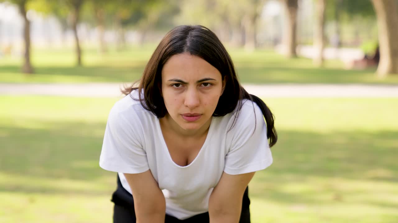 Indian woman sweating hardly after a exercise and workout in a park in ...