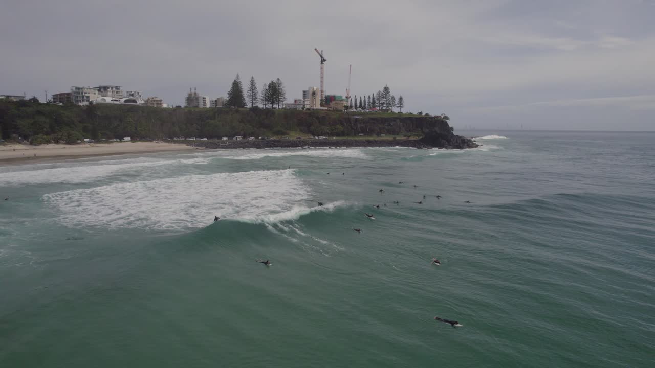 Construction Site In Tweed Heads With Surfers On Seascape In Foreground ...
