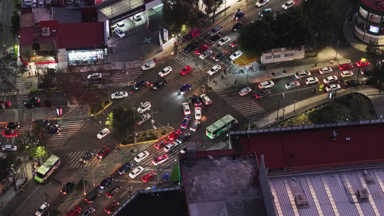 Night drone footage of a complex and congested traffic intersection in ...