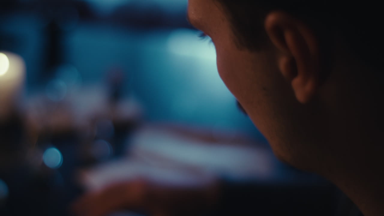Man in Profile in Dim Lighting | Premium Stock Video Footage
