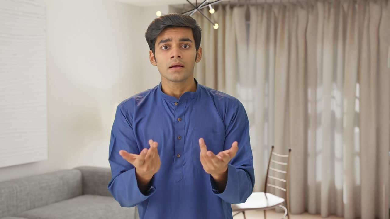 Premium stock video - Leftist indian man asking questions