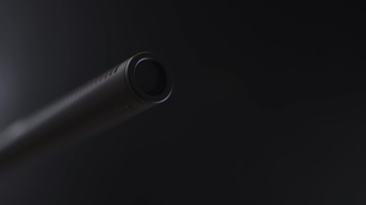 Premium stock video - Slow pan over a microphone - condenser mic ...