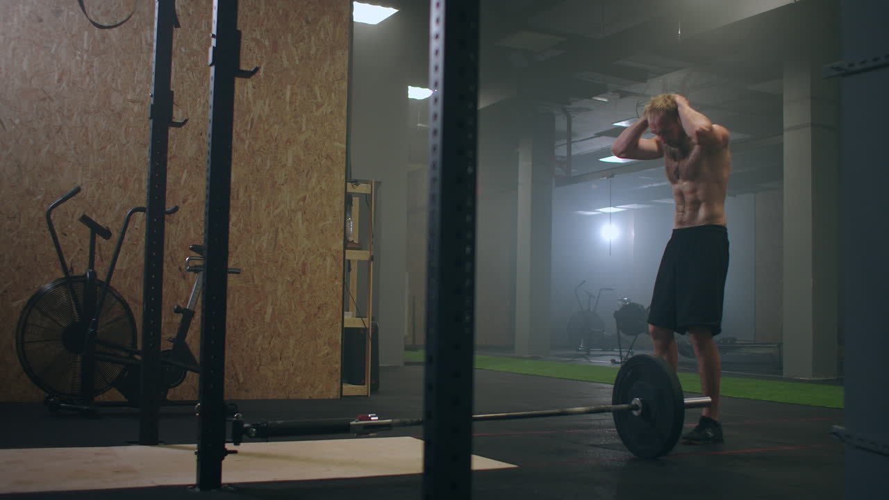 Exhausted Young Men Resting After Intensive Workout In Gym. Exhausted ...