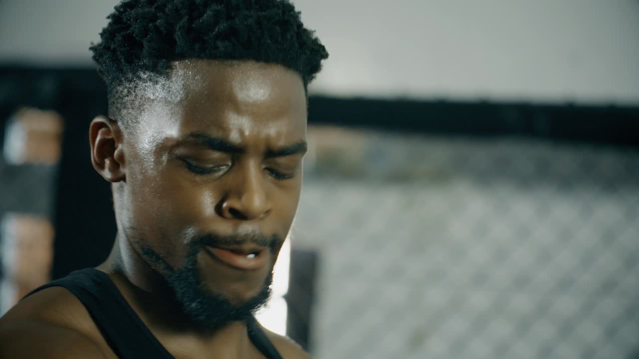 Free stock video - Close up of man lifting weights