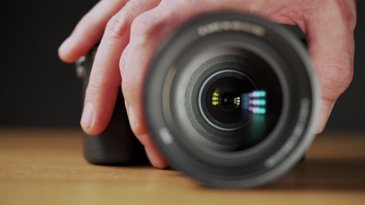 A hand of caucasian man zooming the camera lens out | Premium Stock ...