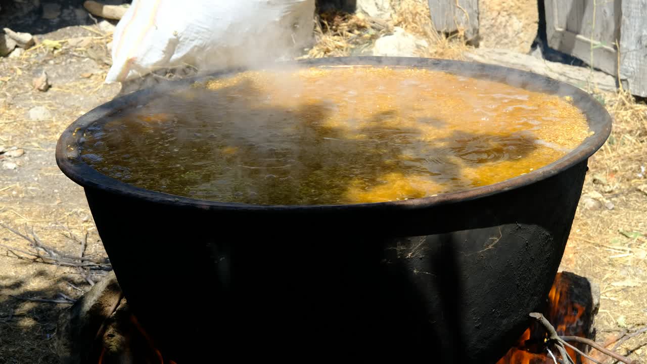 Premium stock video - Boil traditional wheat cooking
