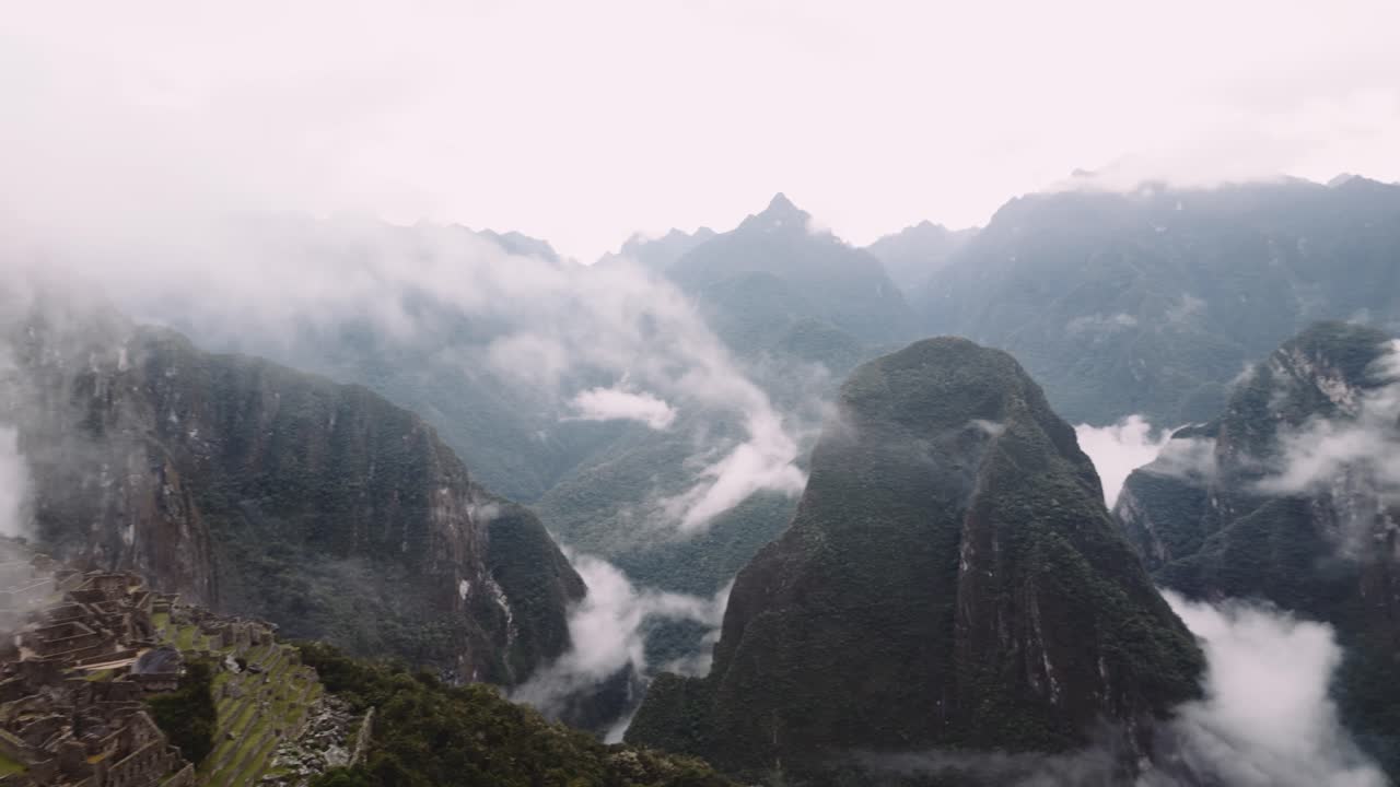 Misty Mountains Over Historic Sanctuary of Machu Picchu In The Andes ...