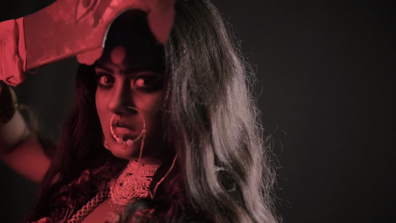 Premium stock video - Angry indian goddess kali looks at camera and ...