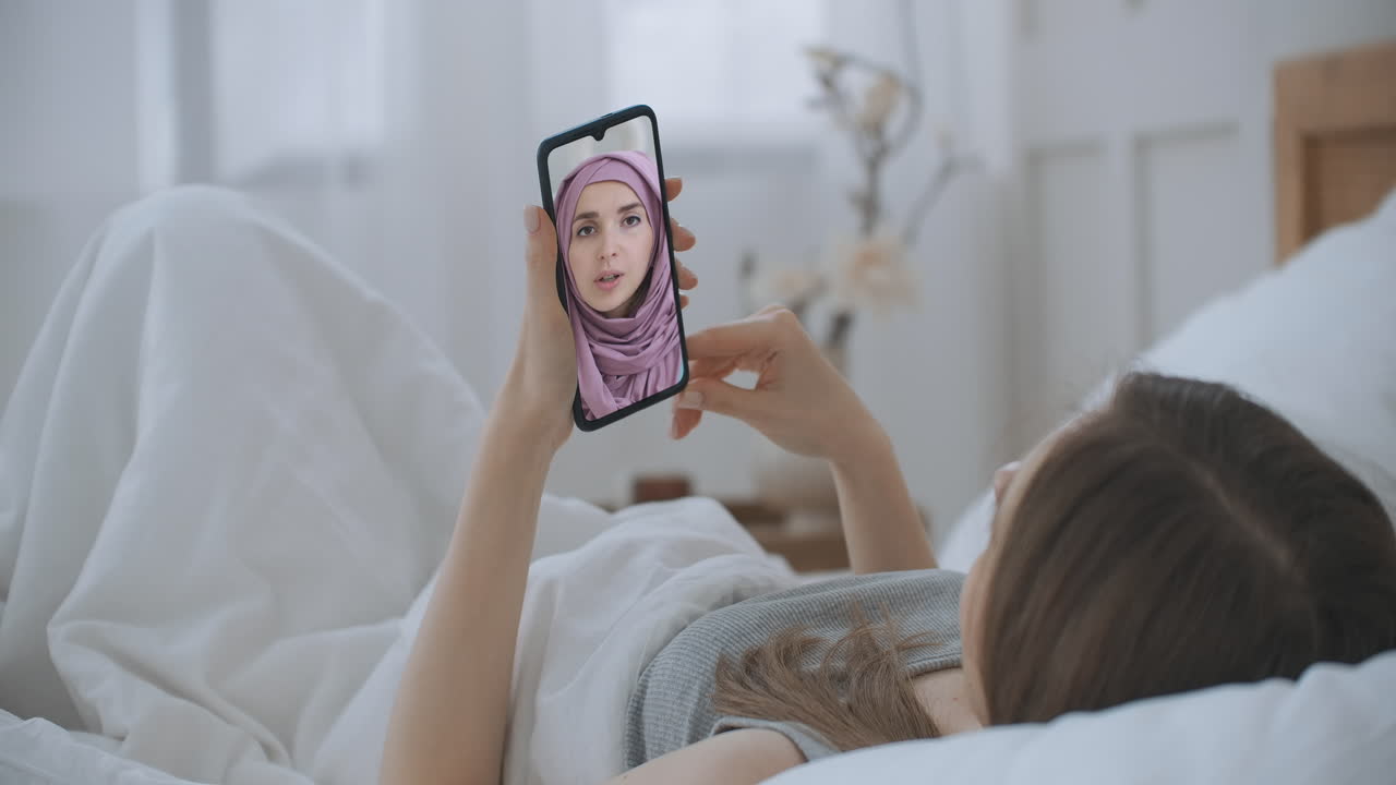 Female Using Medical App On Smartphone Consulting With Arab Muslim ...