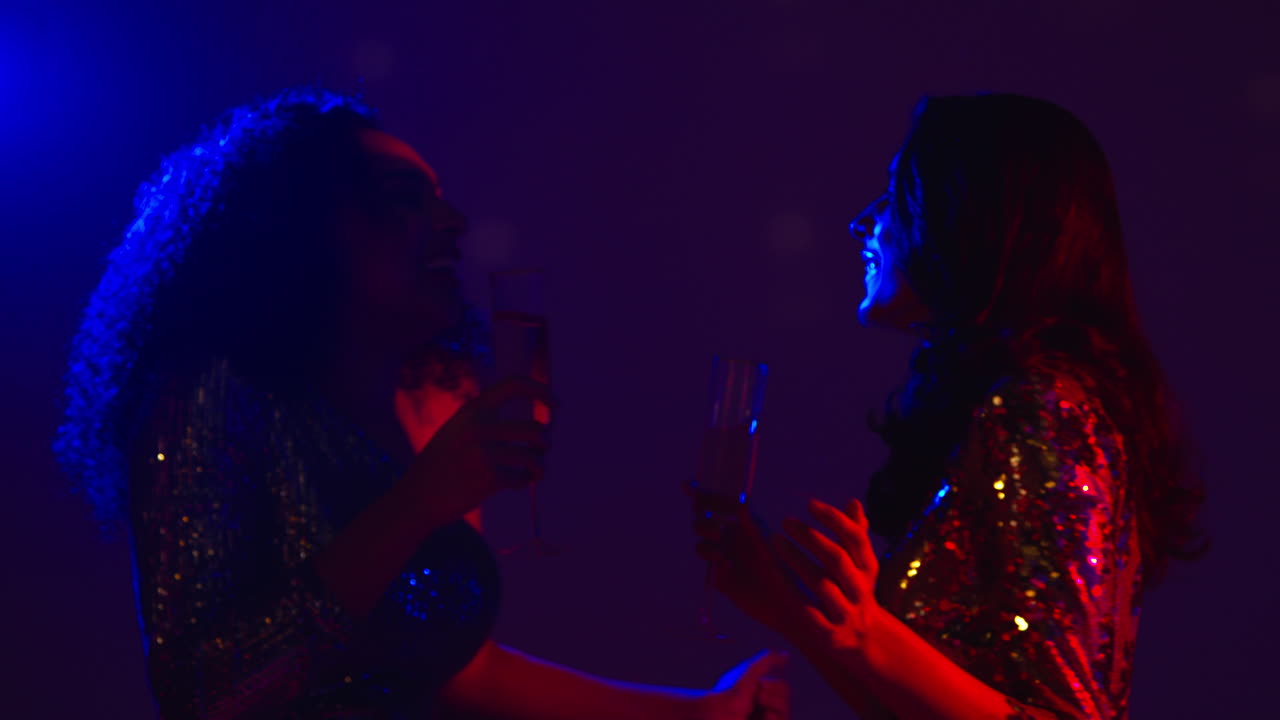 Free stock video - Close up of two women in nightclub or bar ...