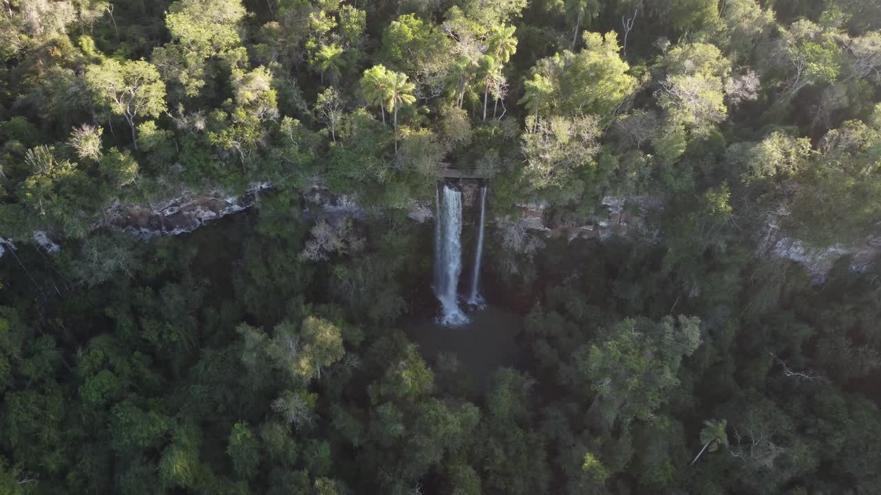 Cinematic Drone Backwards Shot Of Falling Water Of Waterfall In Middle ...