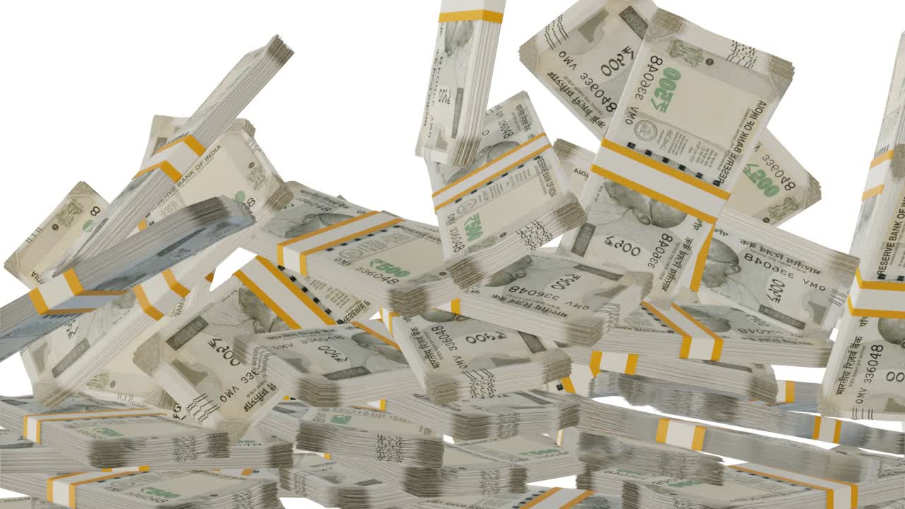 Many wads of money falling on table. 500 Indian Rupees banknotes ...