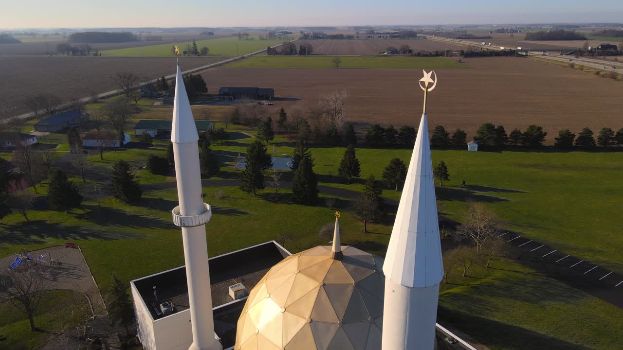 Iconic Mosque with tall towers and symbols in Ohio, aerial view ...