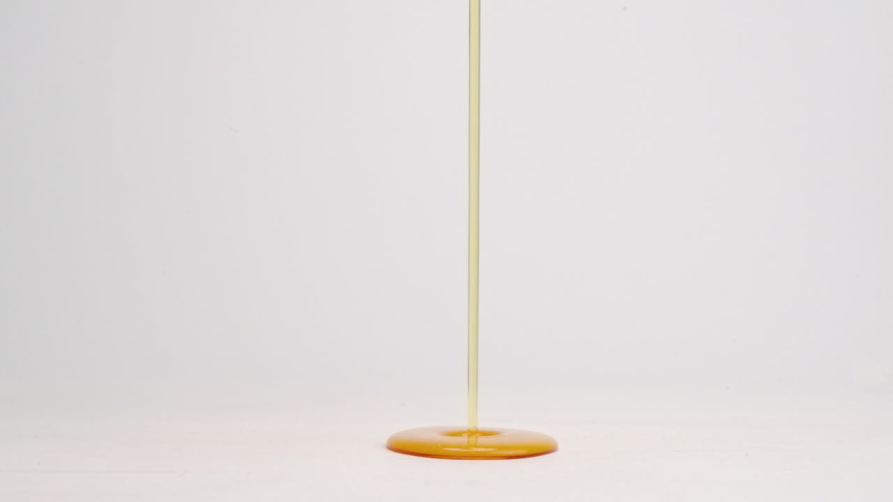 Premium stock video - Brown sticky sweet maple syrup dripping onto ...