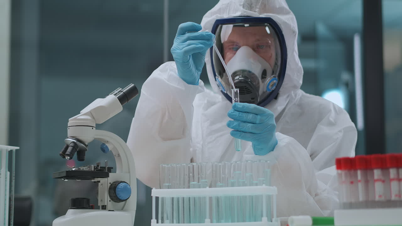 Premium stock video - Male scientist is working with dangerous and ...