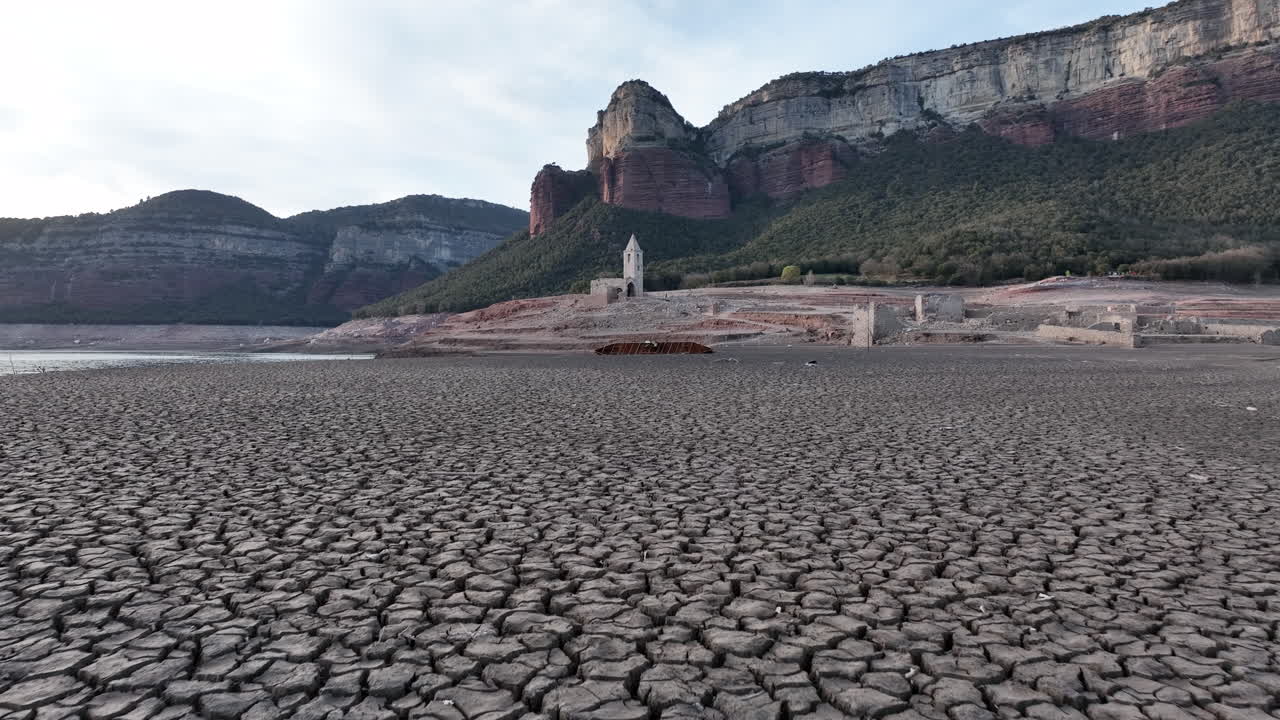 Land With Dry And Cracked Ground In Spanish Village Of Vilanova De Sau ...