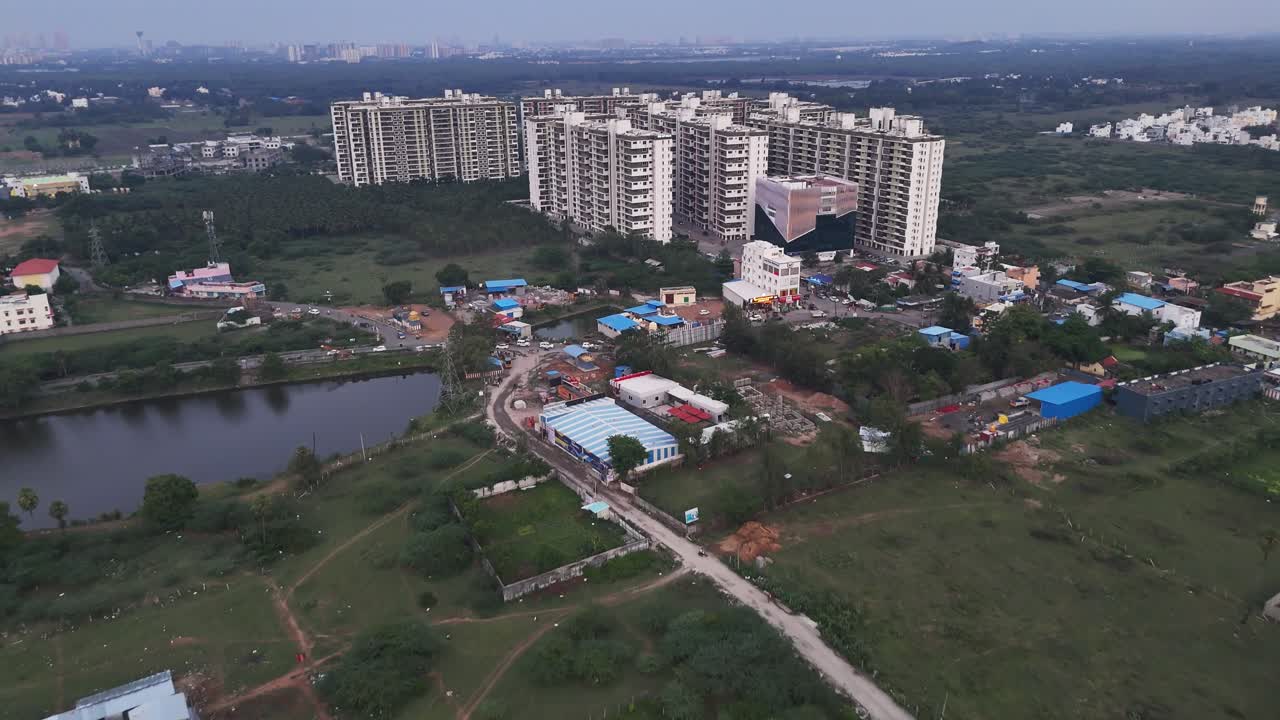 Drone footage of urban development where new residential high-rises ...