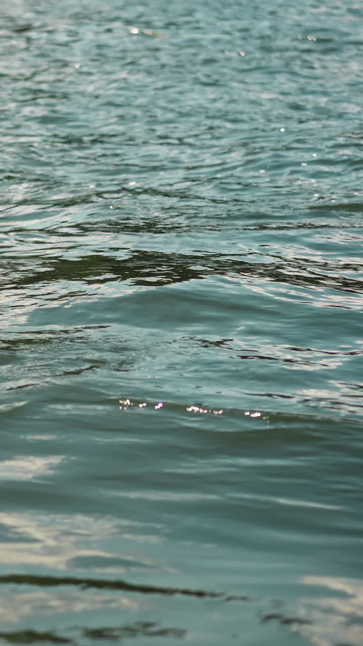 Ocean bay water with running waves on breezy day slow motion. Pure sea ...