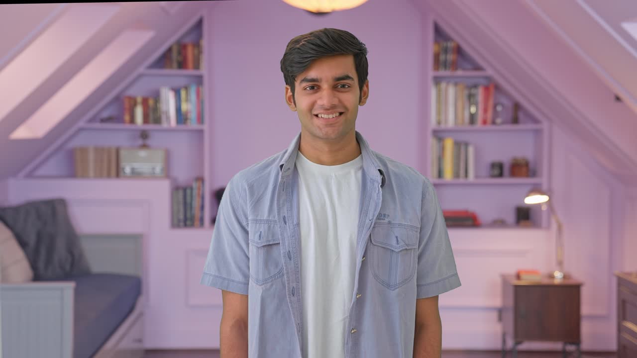 Premium stock video - Happy young indian boy smiling