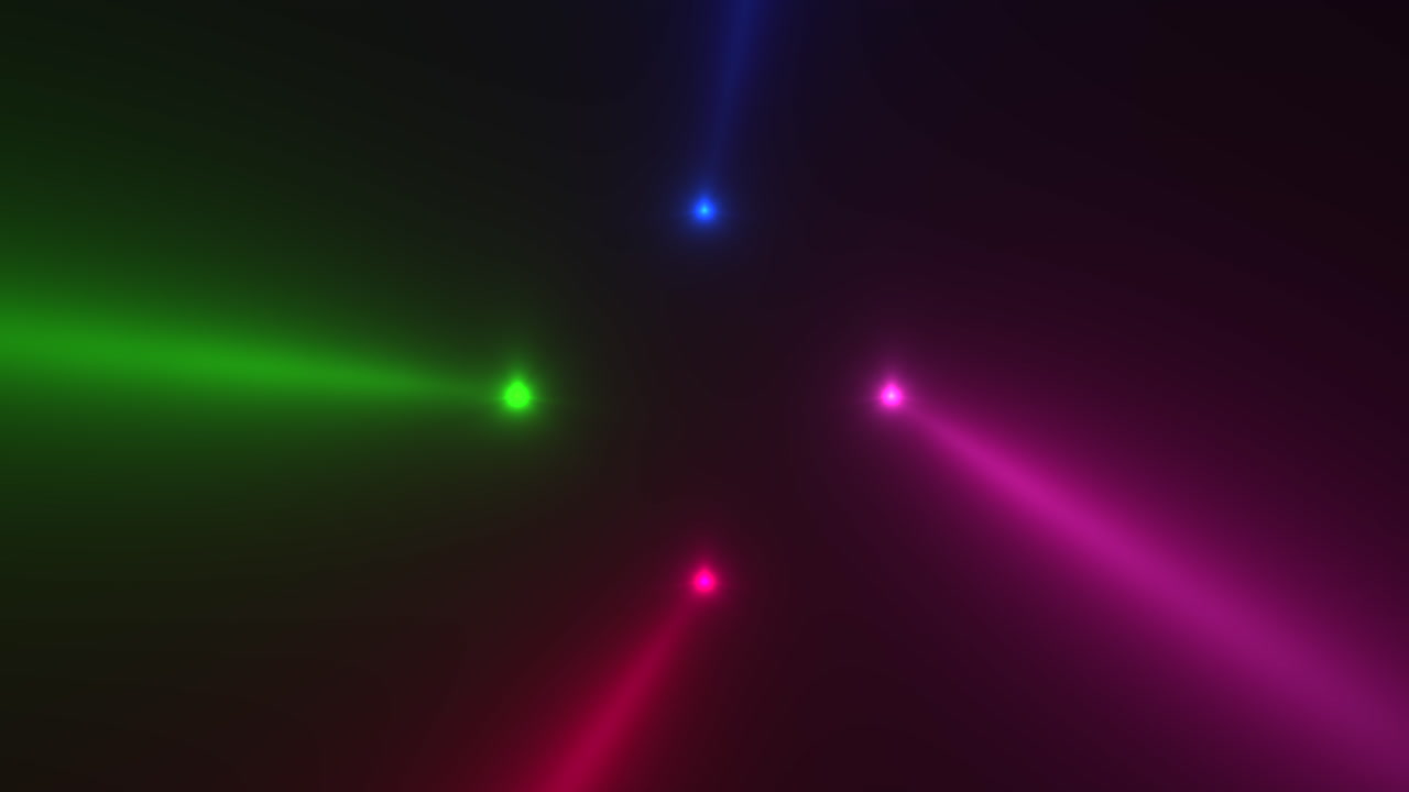 Premium stock video - Glowing neon rainbow spotlight rays on disco stage