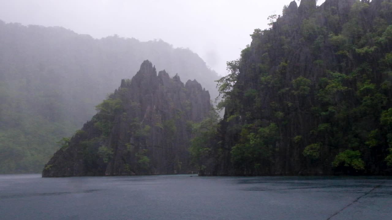 Scenic View Of Rugged Tropical Islands Within Lagoon During Wet Season ...