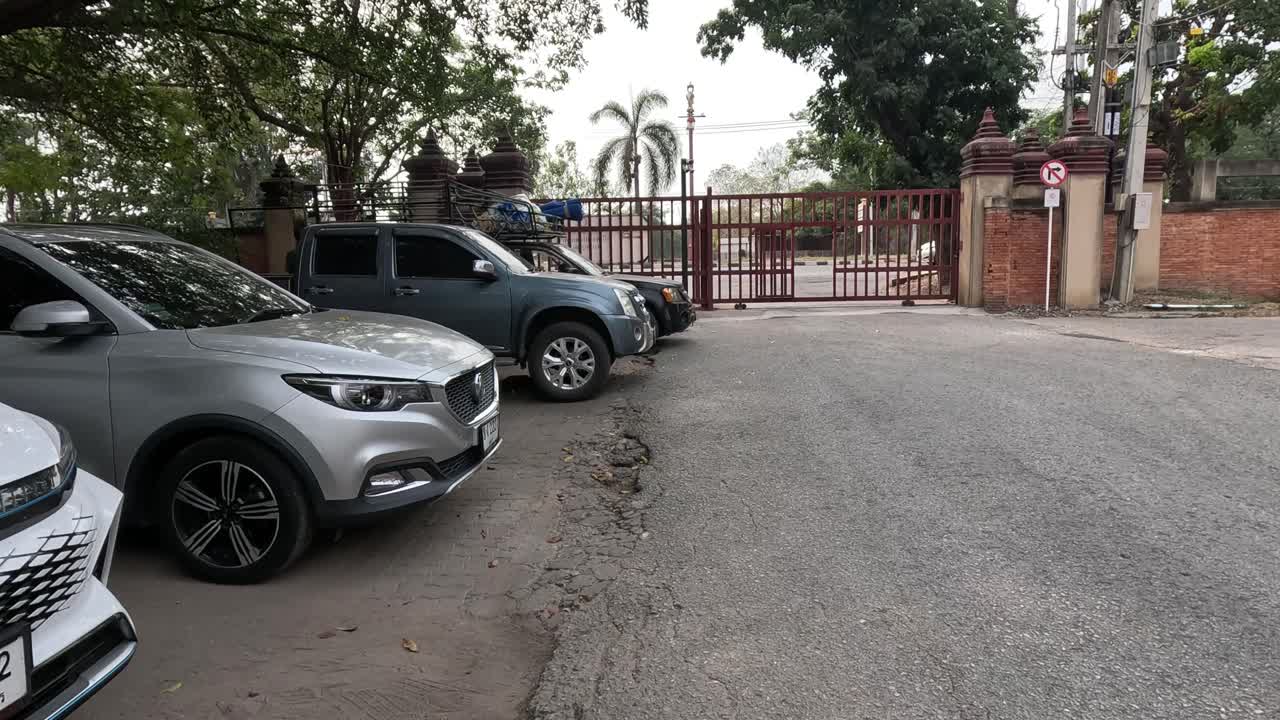 Cars leaving parking lot, approaching closed gate Premium Stock Video ...