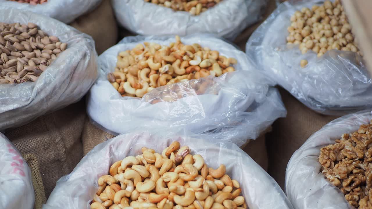 variety of nuts in bags | freepik