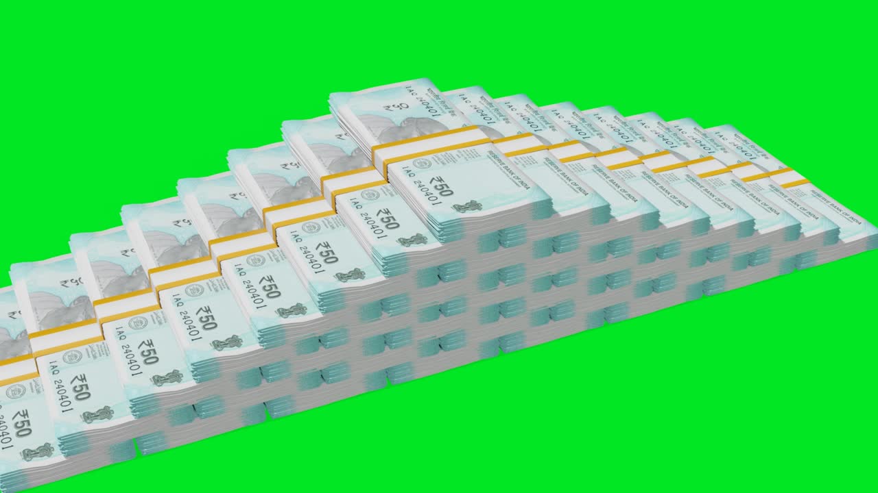 Many wads of money on chromakey background. 50 Indian Rupees banknotes ...
