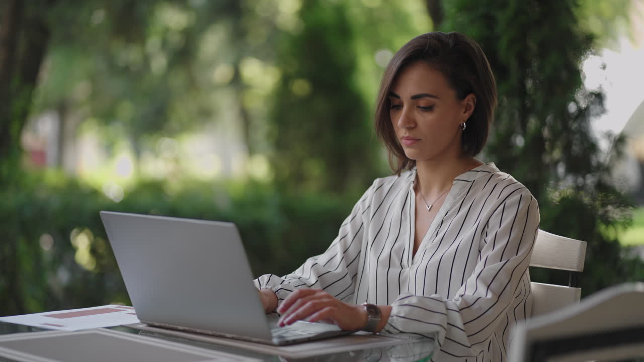 Business woman brunette arabic hispanic ethnicity works remotely while ...