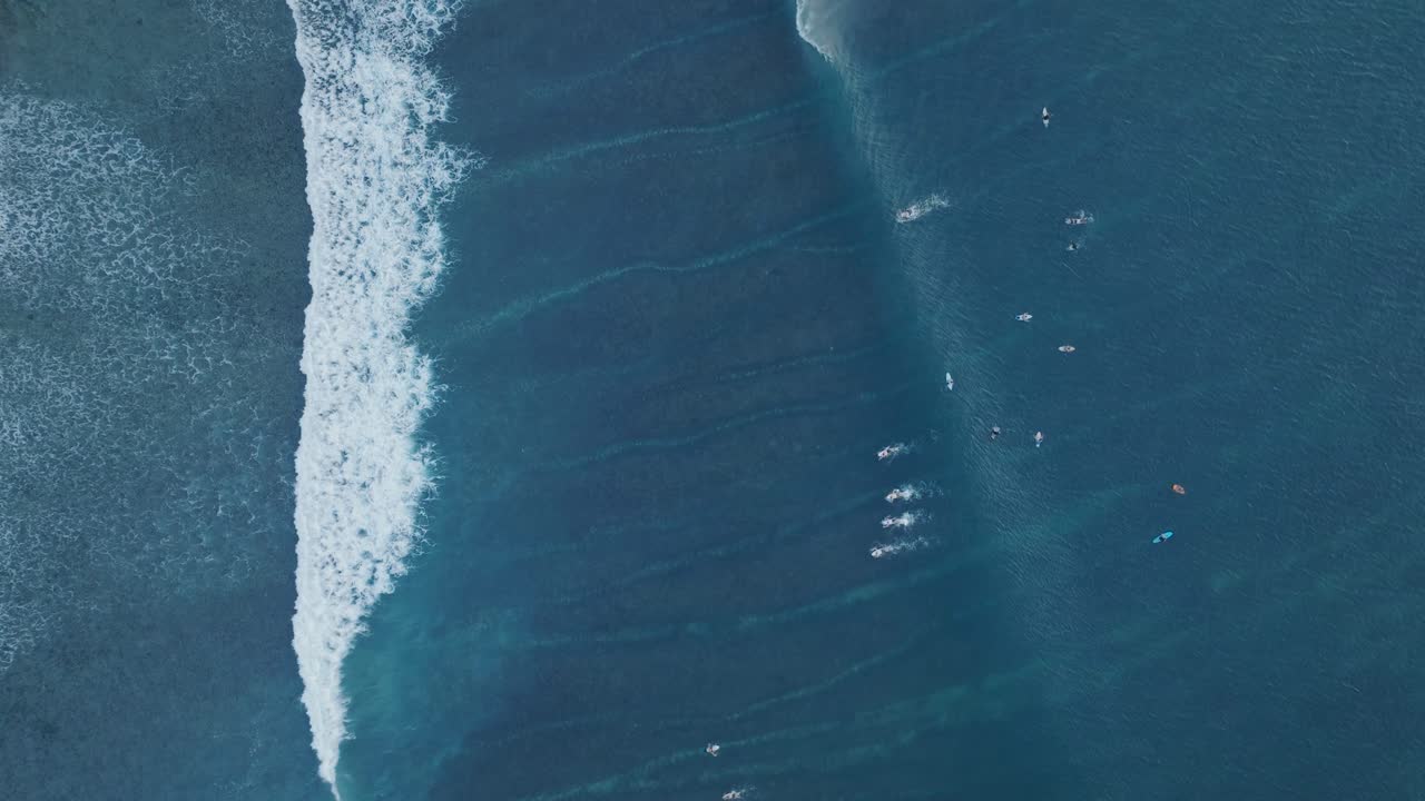 Premium stock video - High altitude top down drone of blue waves ...