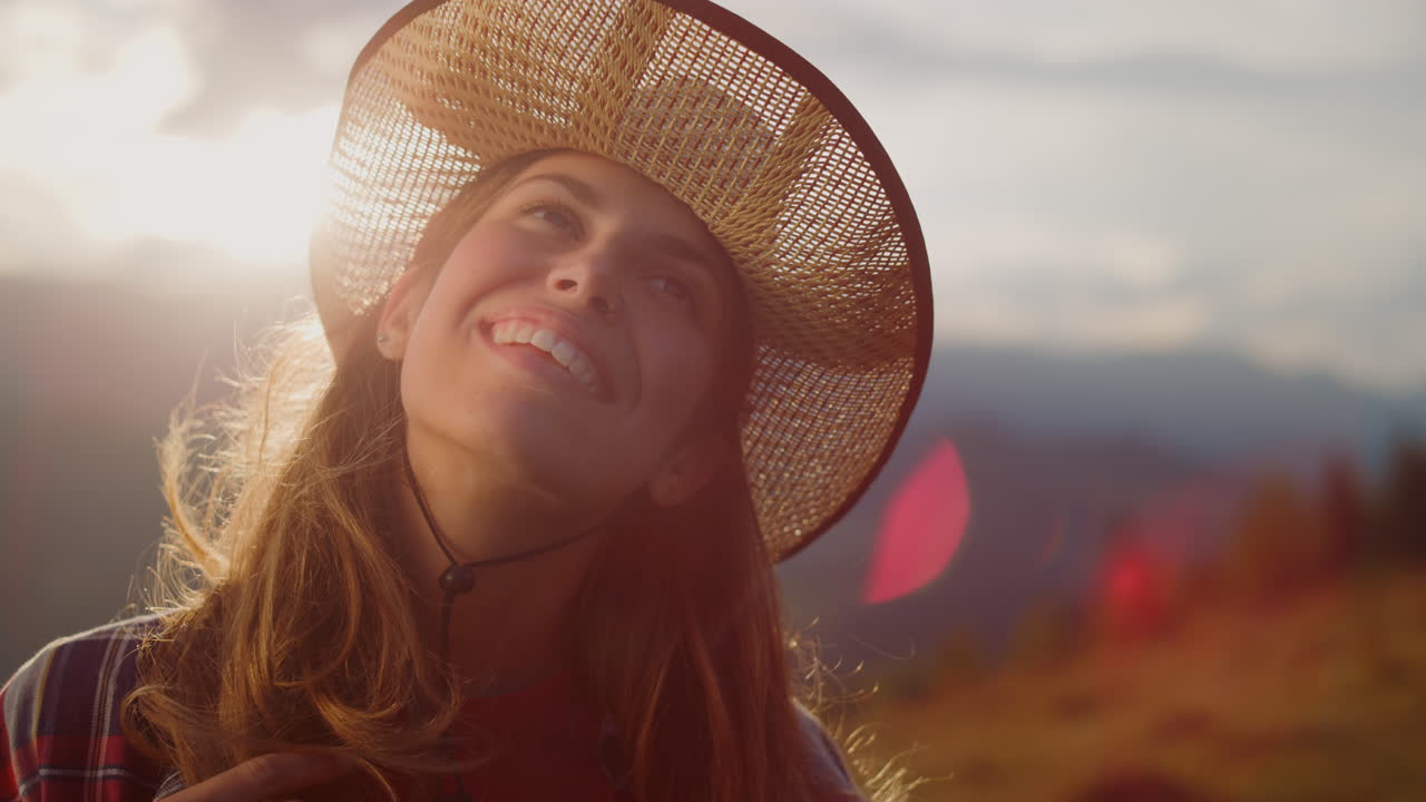 Hiking millennial look camera in mountains sunrise portrait. beauty ...