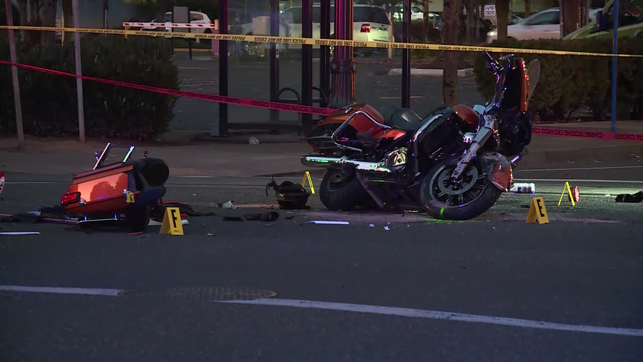 Aftermath of motorcycle crash with pieces of bike all over road ...