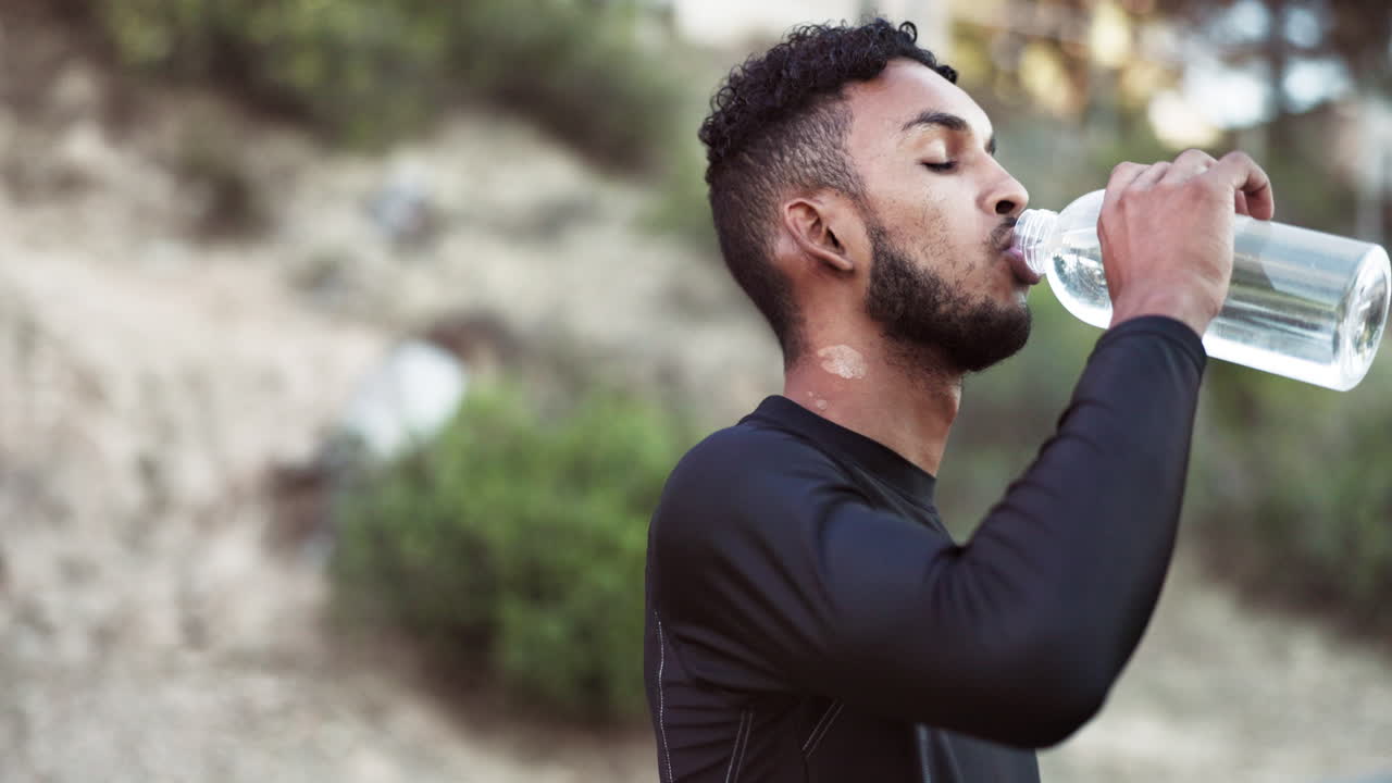 Man, sweating or drinking water in fitness break Premium Stock Video ...