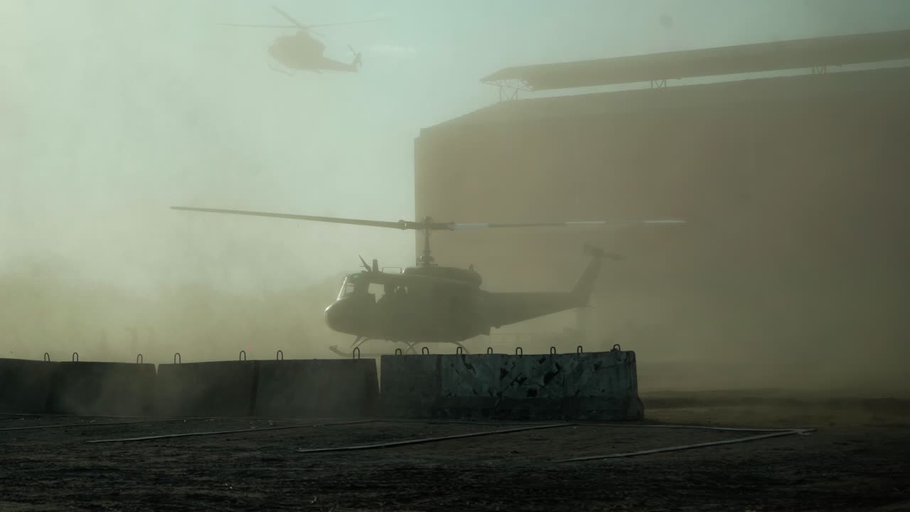 Premium stock video - Two helicopters epic landing. dust. military air ...