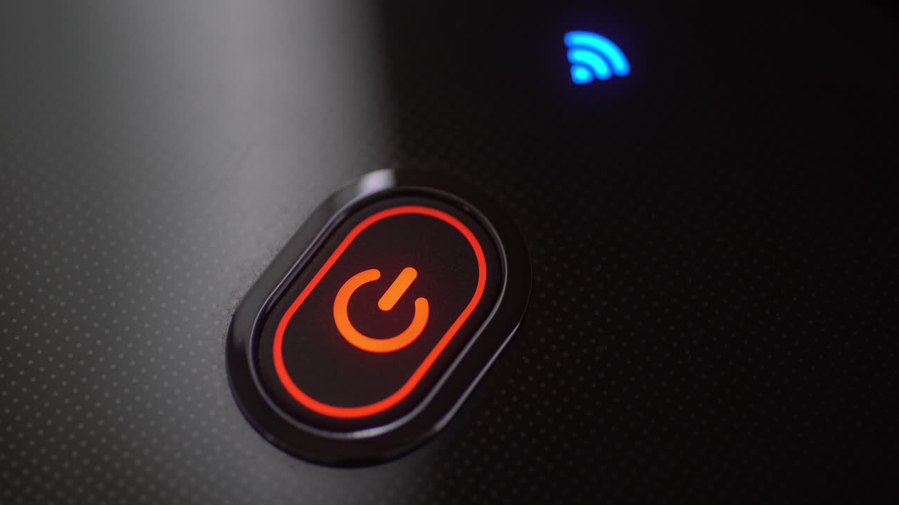 Premium stock video - Closeup shot of a blinking red power button