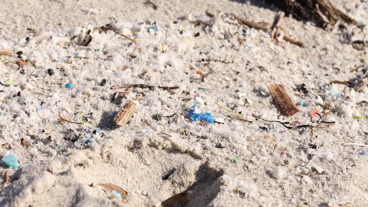 Microplastic Pollution On Beach Sand Highlighting Environmental Issues ...