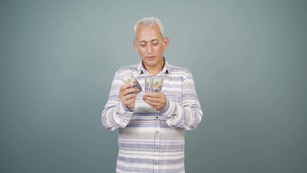 Premium stock video - The man loves money.
