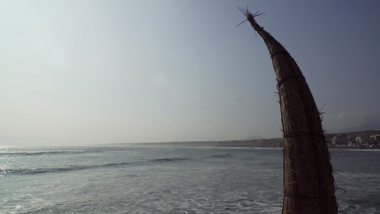 Premium stock video - A traditional caballito de totora boat standing ...