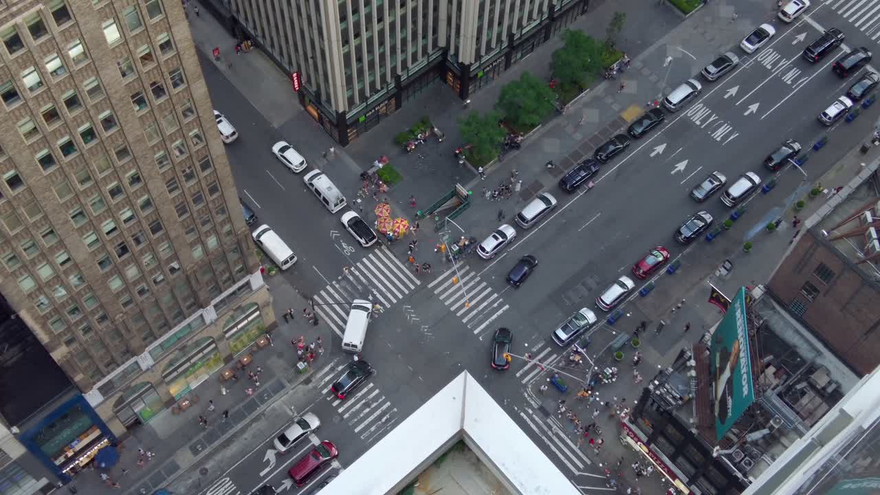 Aerial birds eye overhead top down view of tall office of apartment ...