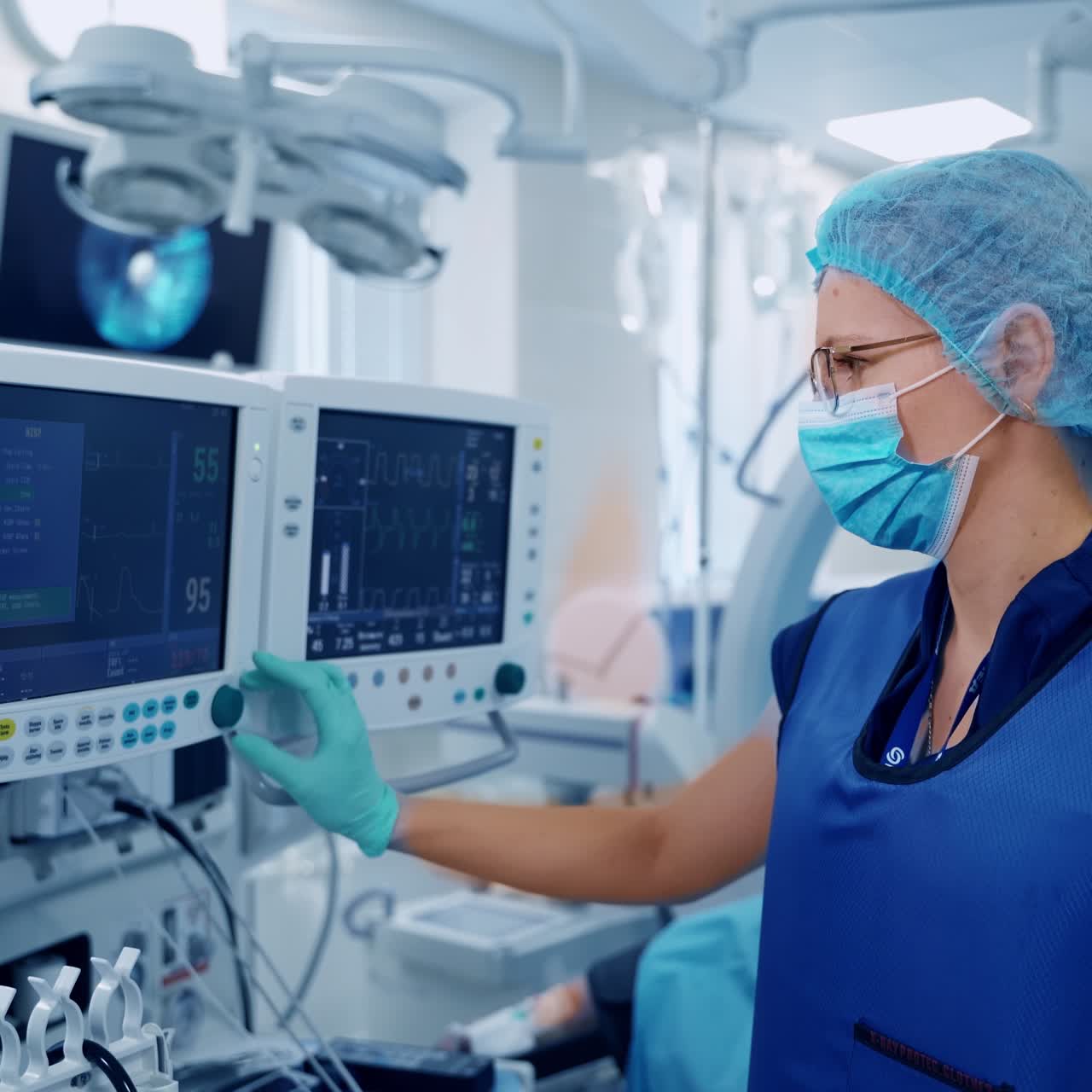 Nurse near ventilator during an operation. Artificial lung ventilation ...