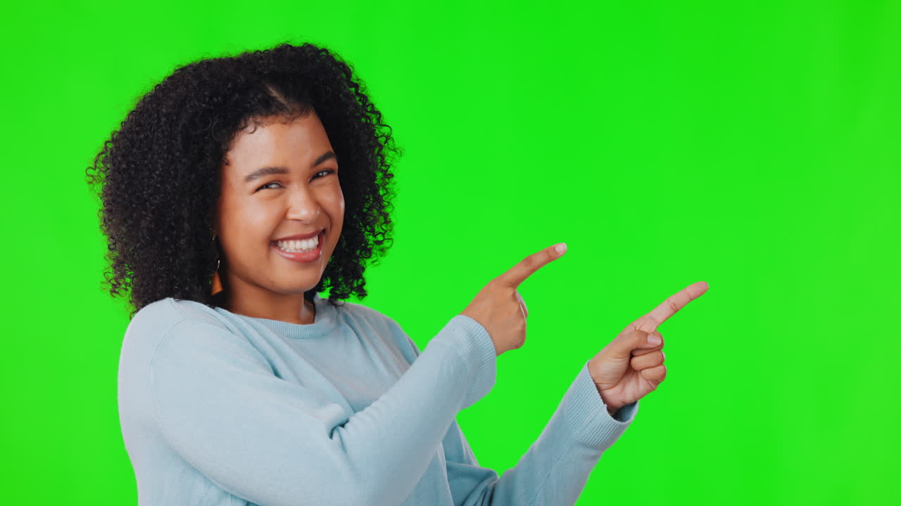 Premium stock video - Woman, pointing finger and laughing on green
