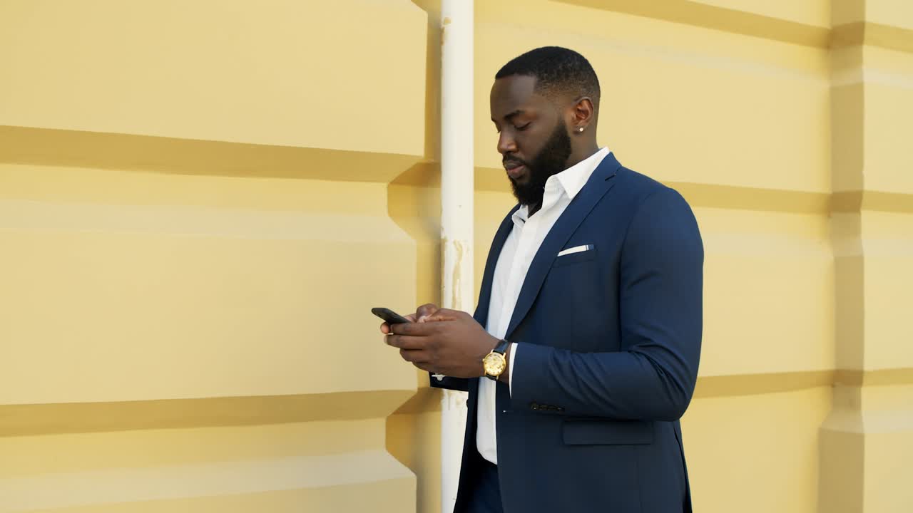 Free stock video - Business man typing message on phone