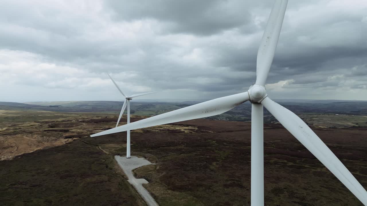 Close Up Drone Aerial Video View Of A Wind Farm And Large Wind Turbines ...