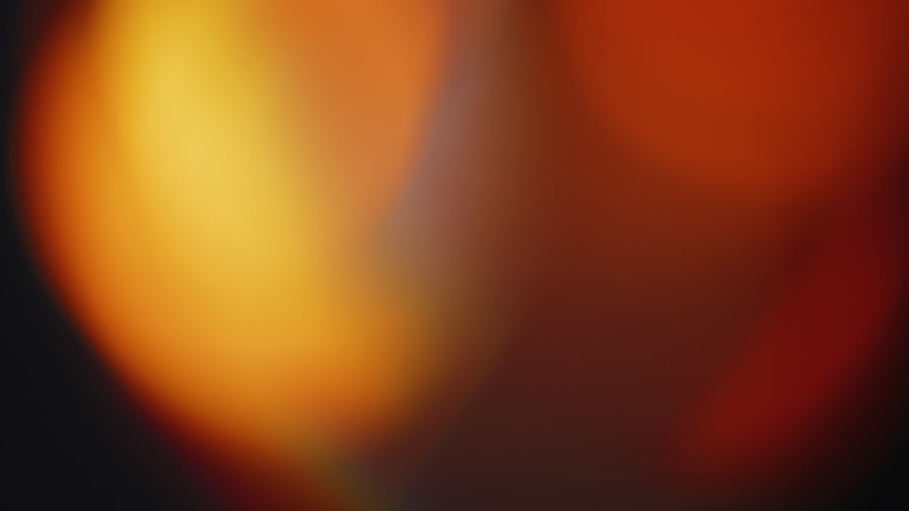 Premium stock video - Multicolored light leaks 4k footage on black ...