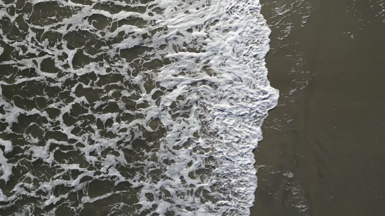 Premium stock video - Waves crash from left to right, aerial drone, oak ...