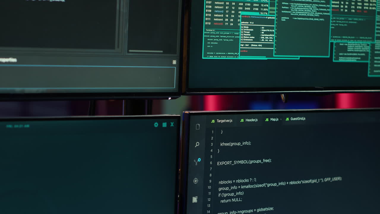 Hacking malware programming script on monitors in underground base Premium Stock Video Footage