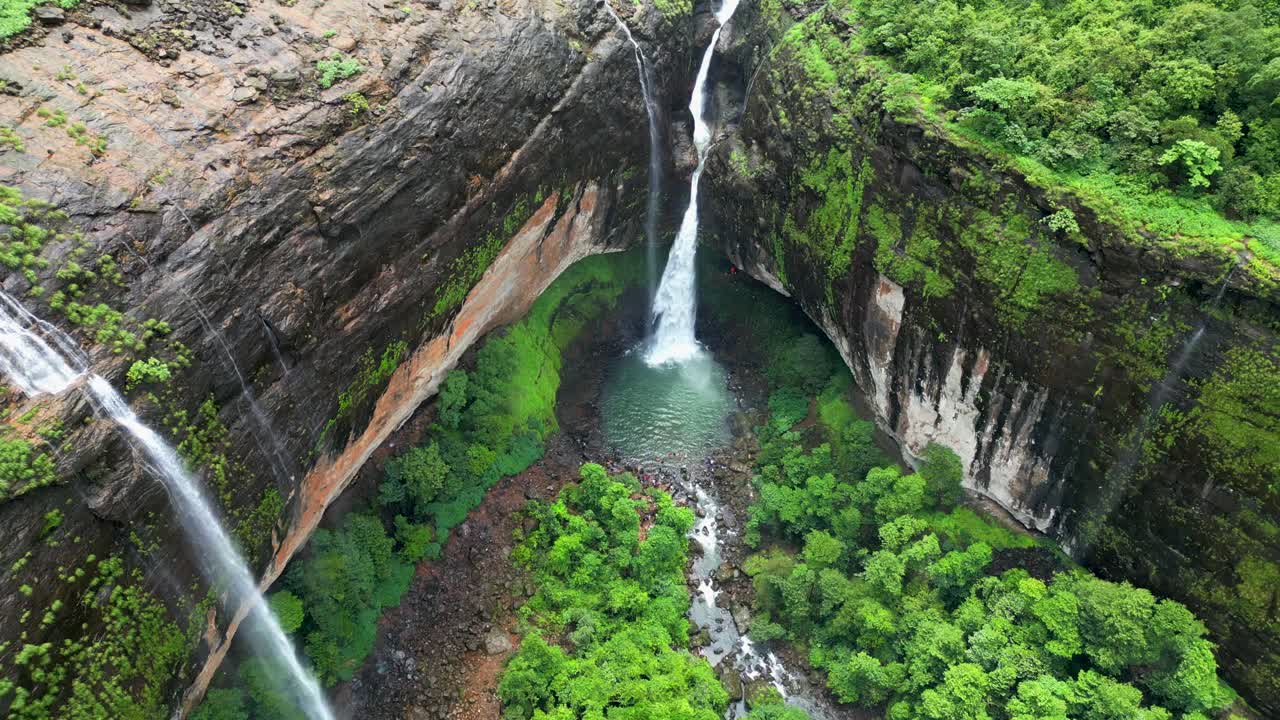 Premium stock video - Beautiful devkund waterfalls bottom to top drone view