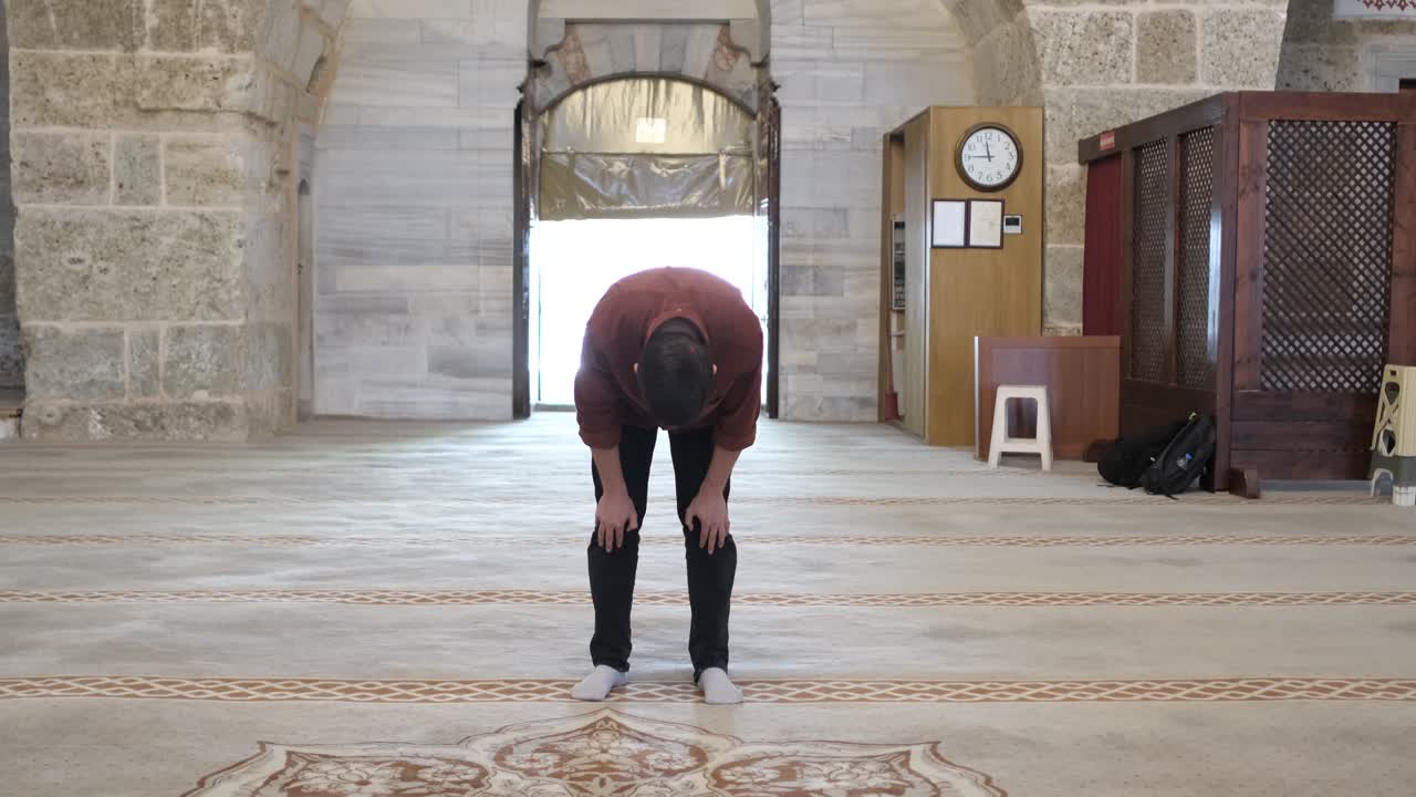 Premium stock video - Muslim goes ruku