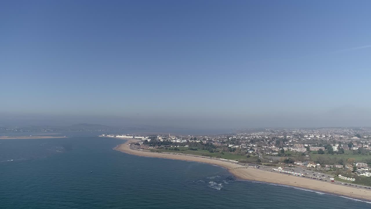 Slow Moving Aerial Vista Looking From The Sea Over The Exe Estuary ...