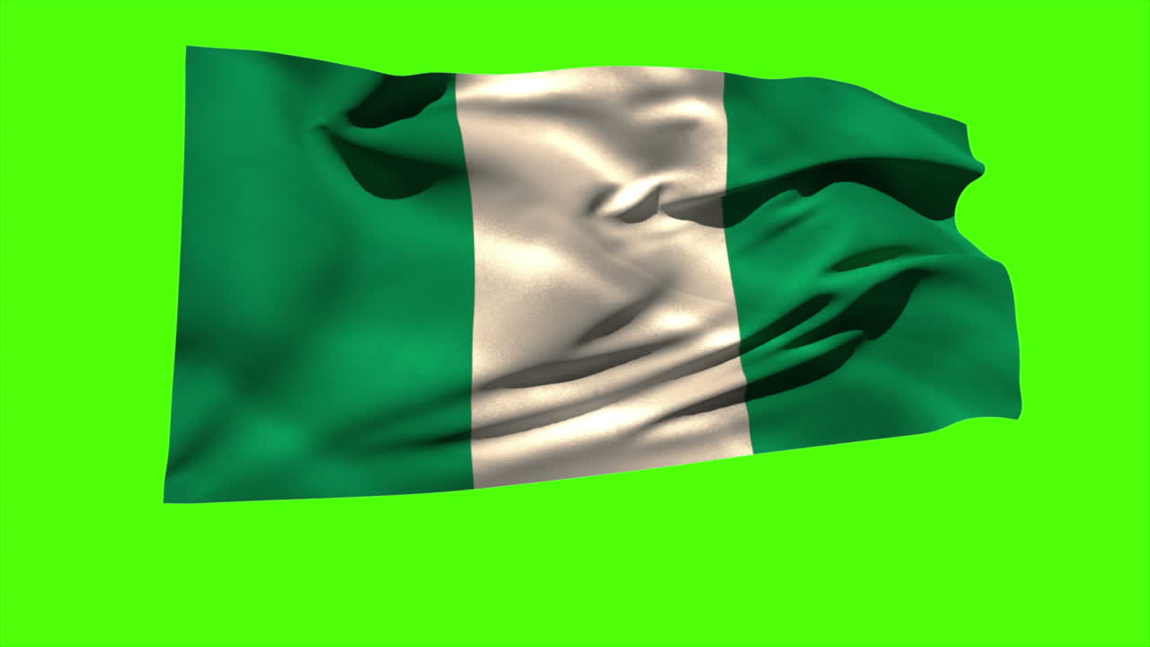 Premium stock video - Nigeria national flag blowing in the breeze
